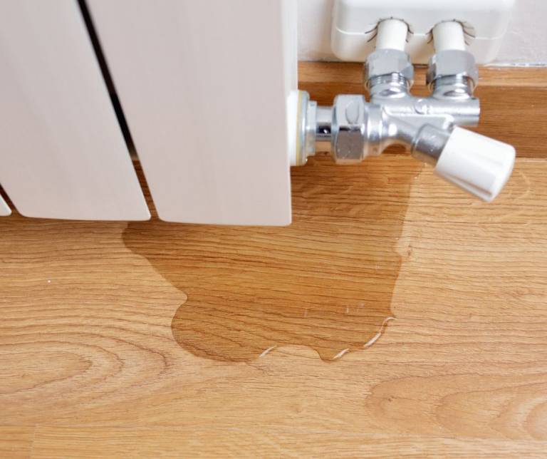 What should the boiler pressure be when the heating is on?